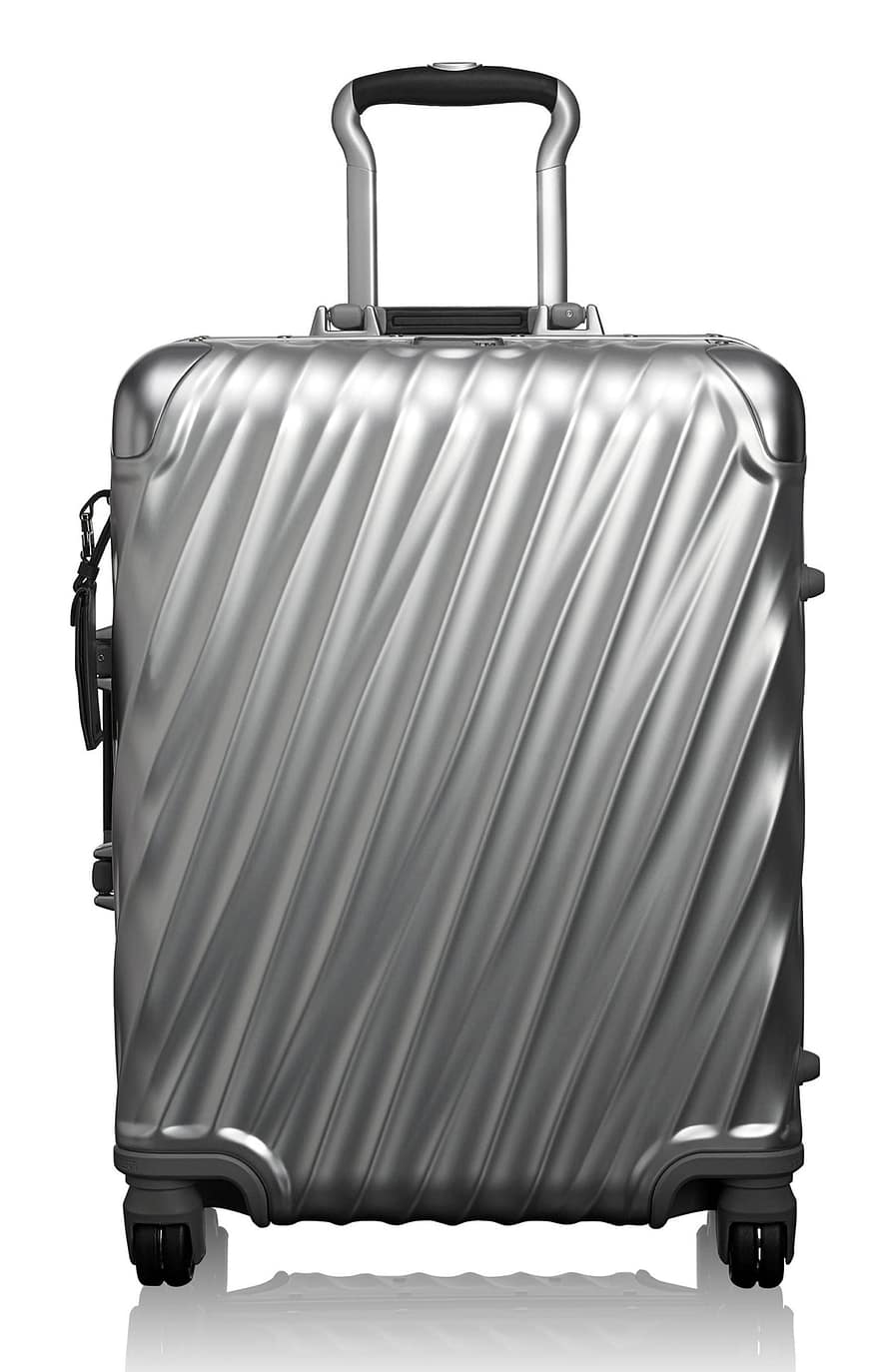 8 Stylish Aluminum Suitcases You’ll Want to Use Forever